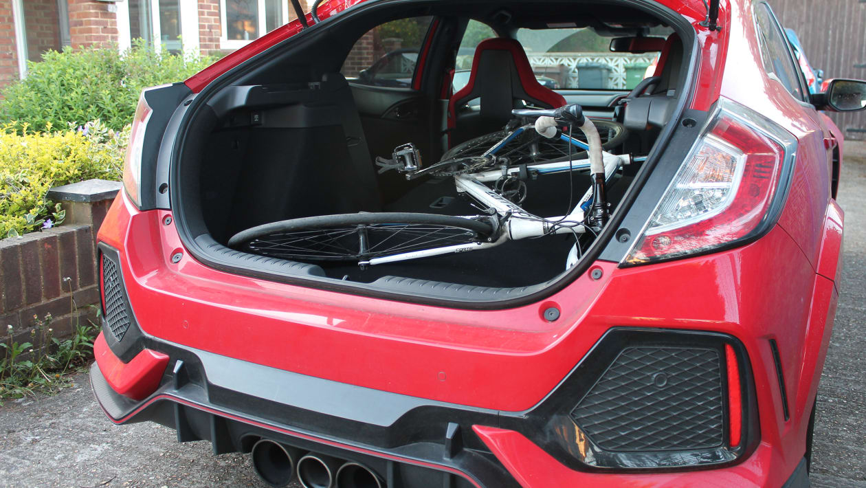 What small/medium cars can fit a road bike without taking the wheels ...