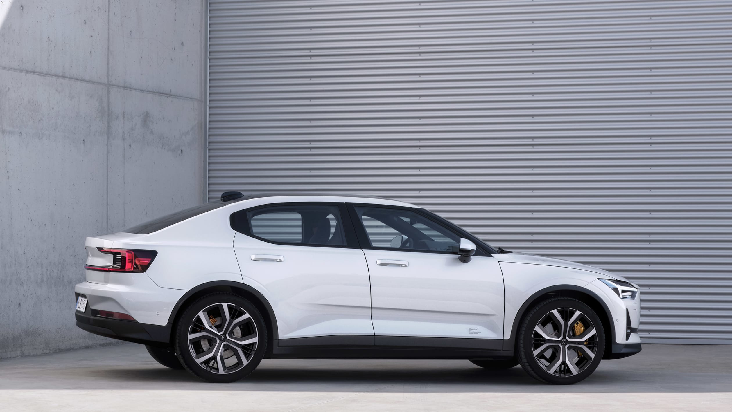New Polestar 2 revealed with 396bhp and 310-mile range - pictures ...