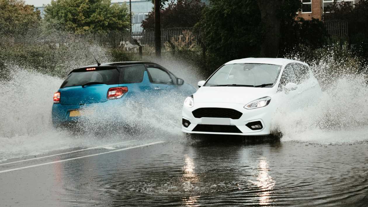 How to drive in heavy rain and flood water | Auto Express