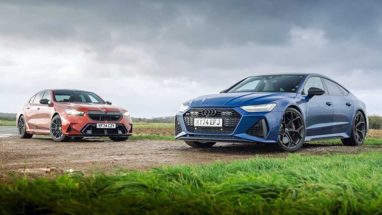 Audi RS7 v BMW M5 – pure V8 battles heavy hybrid | evo