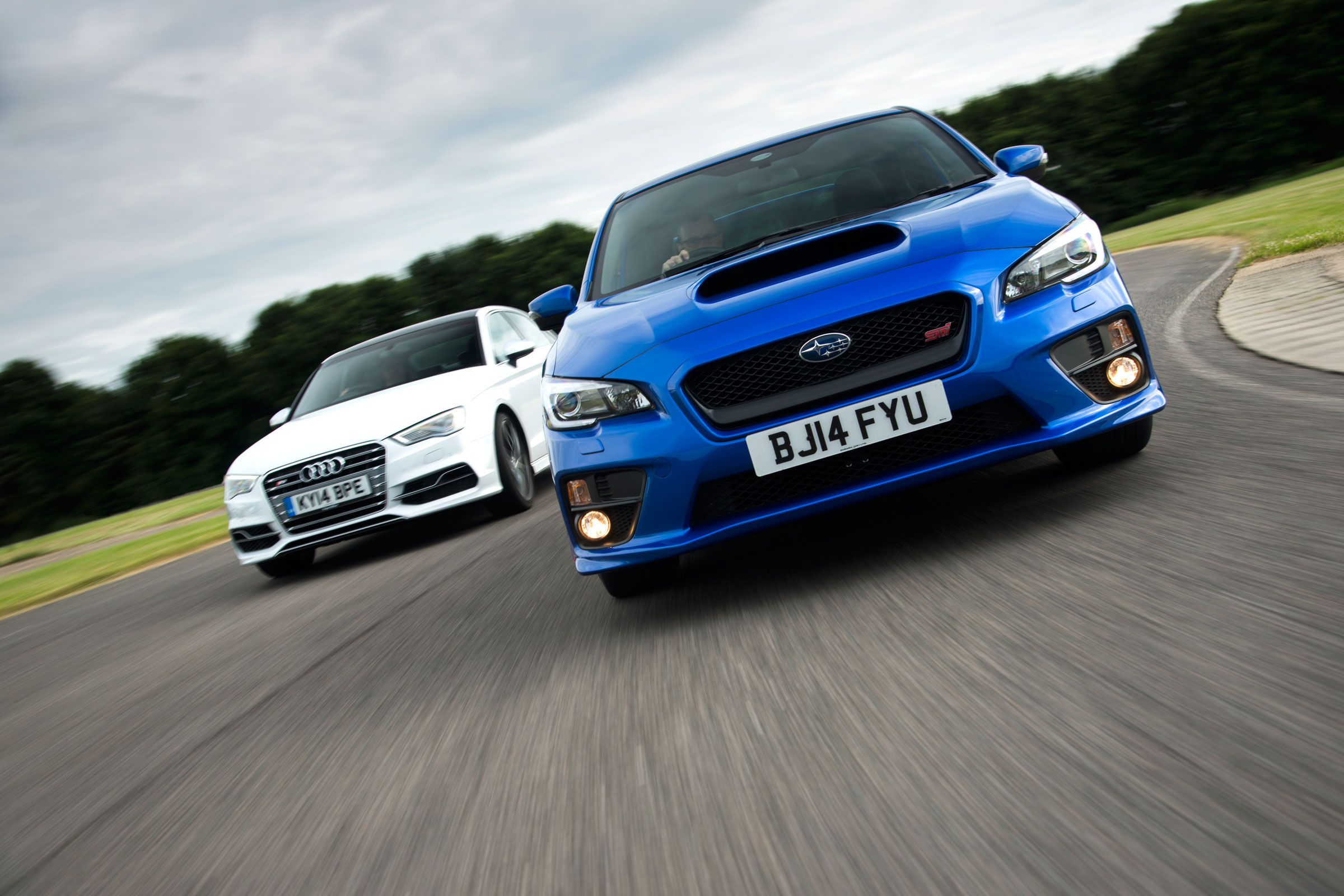 Subaru WRX STi vs Audi S3 | Auto Express